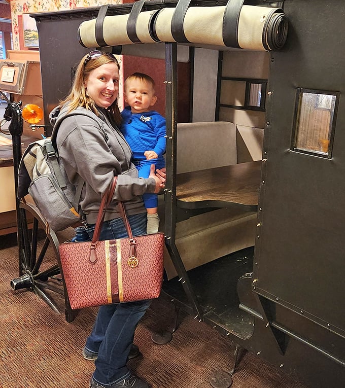 Family memories in the making—the replica buggy display offers a glimpse into Amish transportation while creating perfect photo opportunities.