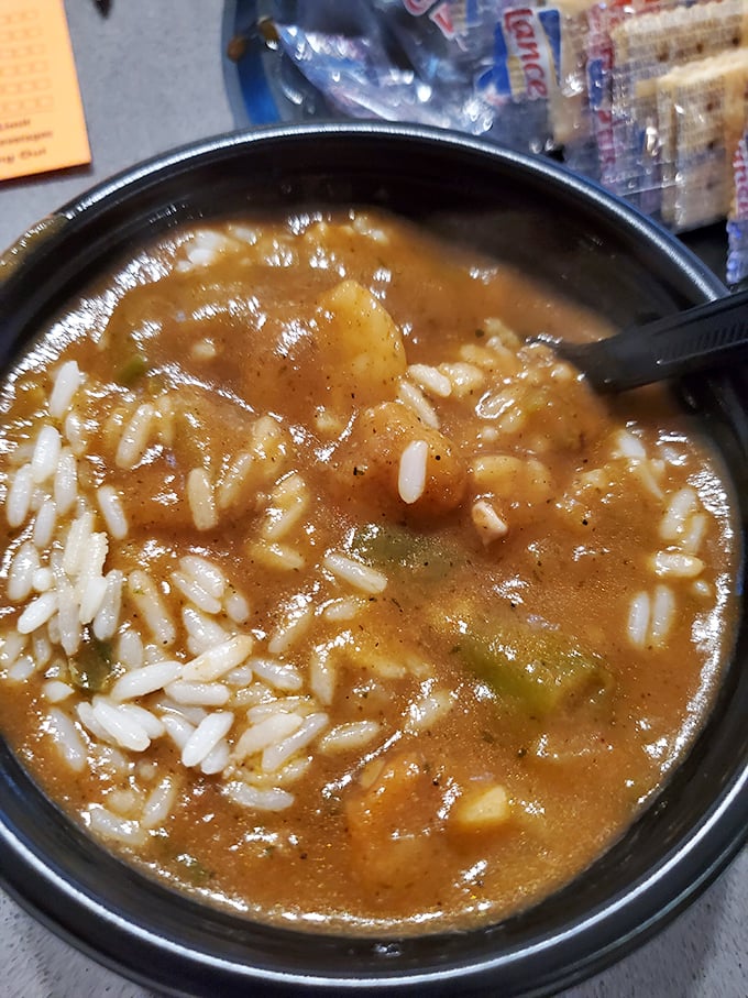 A bowl of seafood gumbo that looks like it contains the secrets of the Gulf – rich, complex, and demanding to be savored slowly.