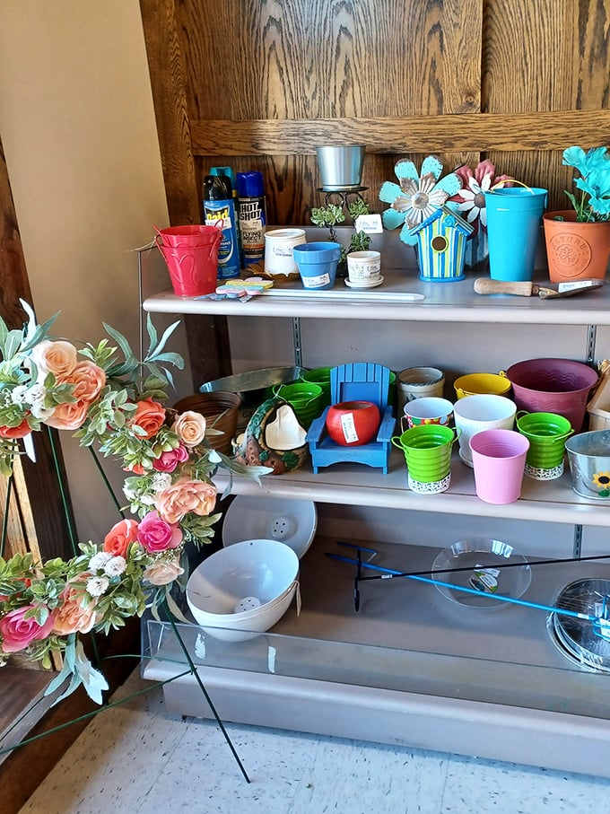 Garden decor and colorful planters await green thumbs on a budget—spring dreams blossom year-round in this cheerful corner.