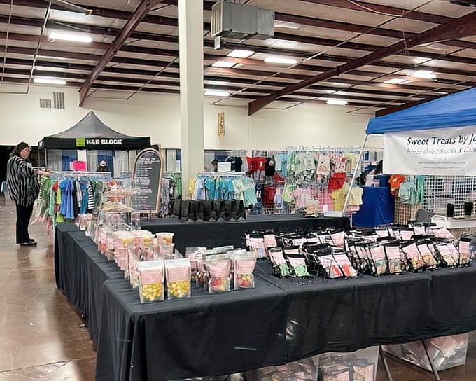 Sweet treats and children's clothing share space in this colorful corner where impulse buys become inevitable souvenirs of your market adventure.
