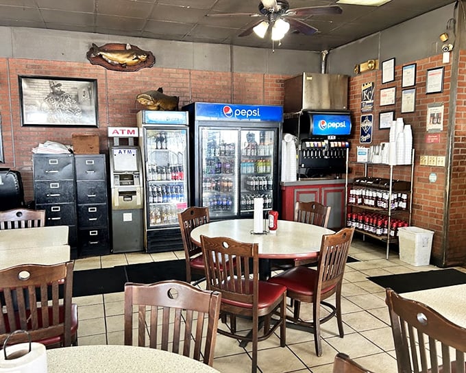 No designer lighting or fancy fixtures here—just the warm glow of barbecue anticipation and decades of smoke-infused wisdom.