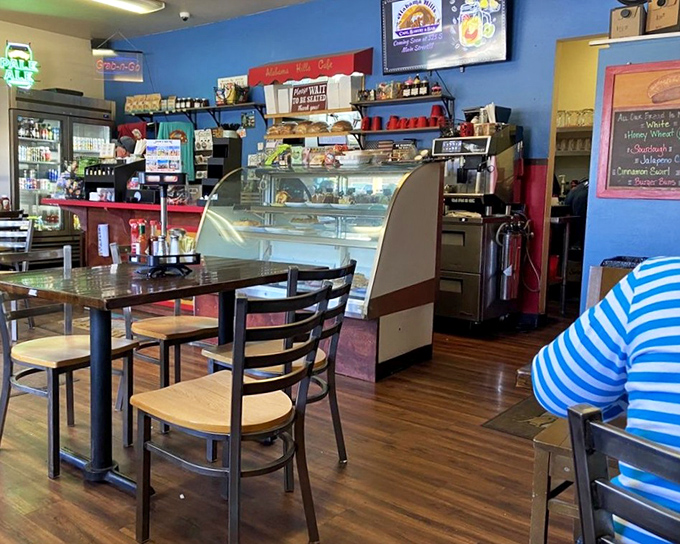 Blue walls and wooden floors create the perfect backdrop for breakfast dreams. Simple, unpretentious, and ready for the main event.