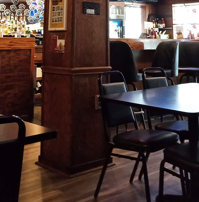 Wood paneling and sturdy tables—dining décor from an era when restaurants were built to last, not just to photograph.