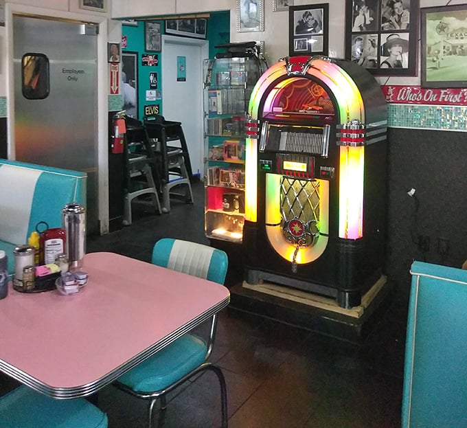 Another jukebox angle reveals the diner's commitment to authentic retro atmosphere, where every detail transports you to simpler, more delicious times.