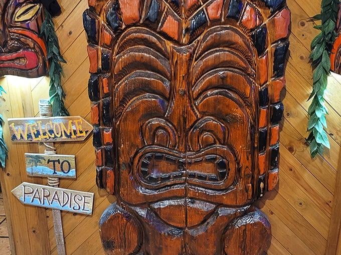 Welcome to Paradise isn't just a sign—it's a promise. This tiki guardian's expression perfectly captures how you'll look after your third crab rangoon.