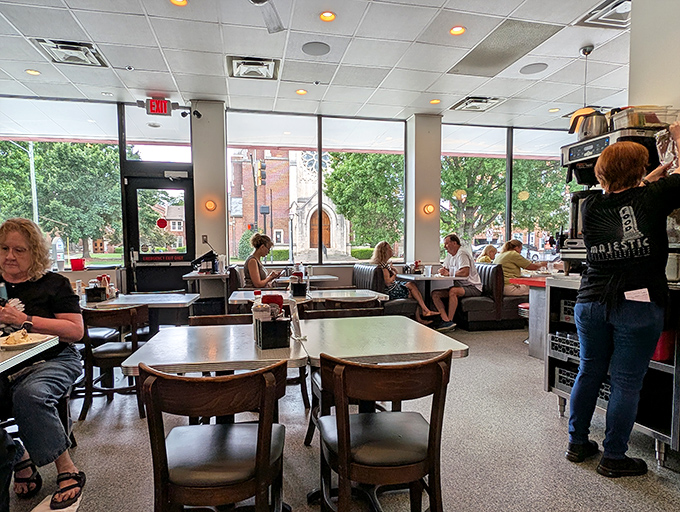 Morning light streams through windows that have framed decades of Atlanta life—from first dates to family traditions, all fueled by endless coffee refills.