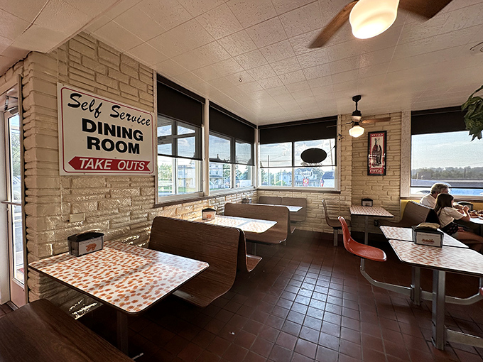 Self-service dining with a side of nostalgia—where the tables have witnessed countless first dates, family gatherings, and solo diners having religious experiences with chicken.