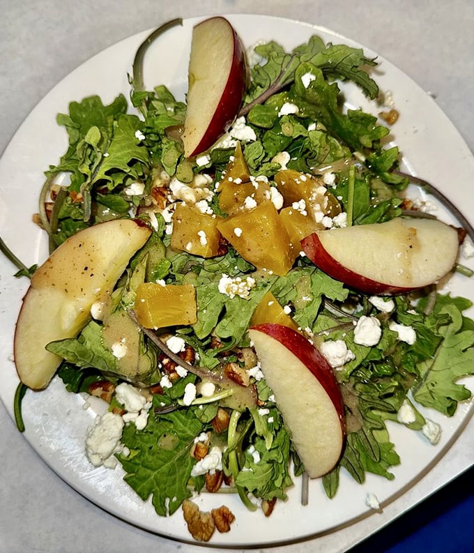 A salad that actually excites—crisp apples, tangy goat cheese, and greens that weren't just an afterthought. Refreshment on a plate.