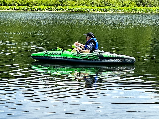 Solo kayaking on glass-like waters – sometimes the best company is the gentle splash of your paddle and your own thoughts.
