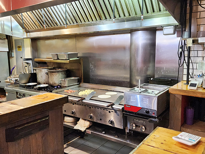 Where the magic happens—this kitchen has witnessed more breakfast miracles than most churches have Sunday services.