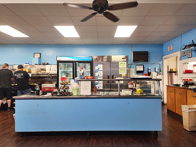 The open kitchen where culinary magic happens – no smoke and mirrors, just honest cooking where you can watch your meal come to life.