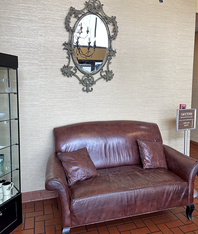 The waiting area's leather loveseat and ornate mirror suggest that good things come to those who wait—especially when stuffed chicken breast is the reward.