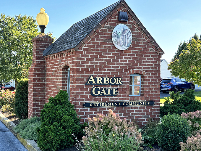 The entrance sign that says "you've arrived" in more ways than one. Brick and mortar confirmation that retirement planning wasn't just a fantasy after all.