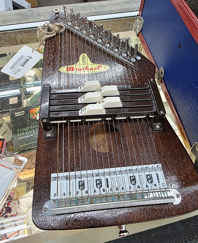 A vintage Meinhart autoharp waits silently for fingers to once again strum its strings and release melodies from another era.