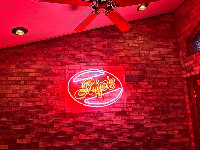 The neon Rip's sign glows against brick walls like a bat signal for the fried-chicken obsessed. Many have answered its call.