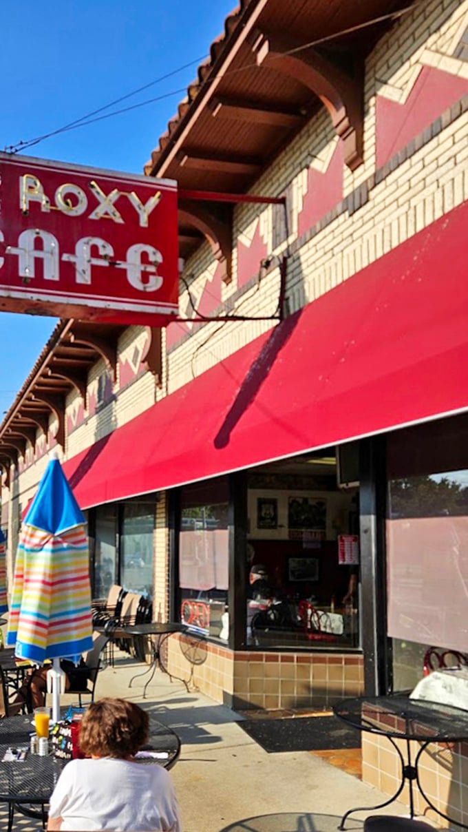The outdoor seating offers front-row tickets to downtown Jackson's daily theater, with breakfast as your intermission treat.