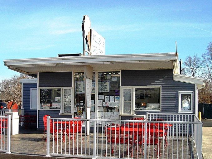 The outdoor seating area where memories are made between bites—red tables that have witnessed first dates, family celebrations, and countless "we should come here more often" promises.