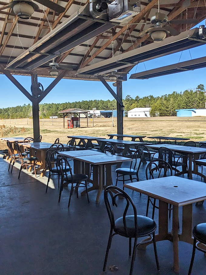 Al fresco dining with a view of the airfield. These tables aren't just outdoor seating; they're front-row seats to a uniquely American experience.