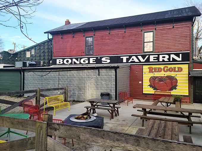 The outdoor area with fire pit and picnic tables is where the famous "tailgating" tradition happens—a pre-dinner party that's become as legendary as the meals themselves.