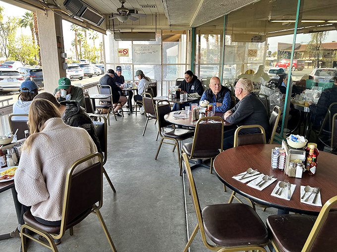 The outdoor patio where Palm Desert's morning light makes everything—especially your breakfast companions—look just a little bit better.