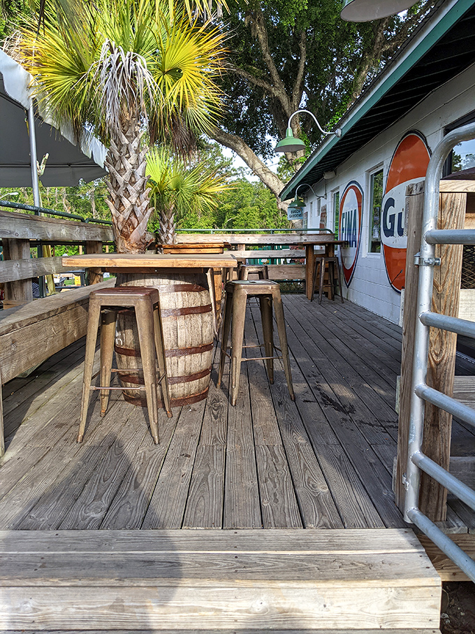 Outdoor seating under palm trees—because some breakfasts deserve to be enjoyed with a side of Florida breeze and dappled sunshine.