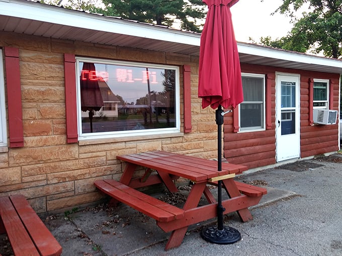 Outdoor seating where the fresh air somehow makes everything taste even better. Red picnic tables invite you to linger just a little longer over that second slice of pie.