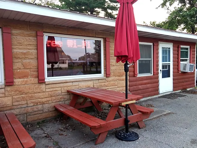 Outdoor seating where the fresh air somehow makes everything taste even better. Red picnic tables invite you to linger just a little longer over that second slice of pie.