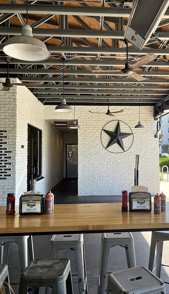 Texas stars and industrial lighting create the perfect backdrop for barbecue contemplation—because good smoked meat deserves a moment of reflection.