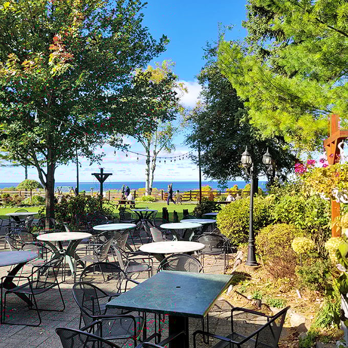 Lake Michigan views provide the stunning backdrop for outdoor dining that rivals any expensive resort destination experience.