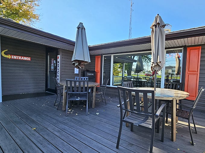 The outdoor deck—where summer memories are made between bites. Those tables have heard more genuine laughter than most comedy clubs.