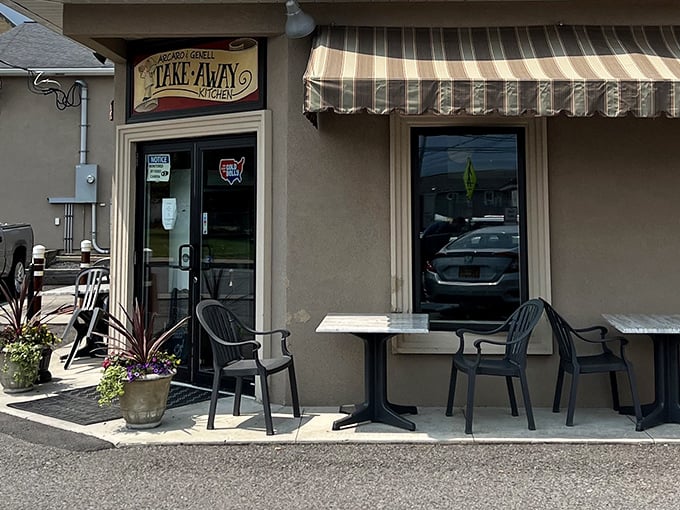 Outdoor seating for those who can't wait to dive into their rectangular treasure—patience is overrated when pizza calls.
