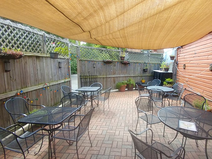 The outdoor patio offers a breath of fresh air without sacrificing comfort – the perfect setting for summer evenings when indoors feels like giving up.
