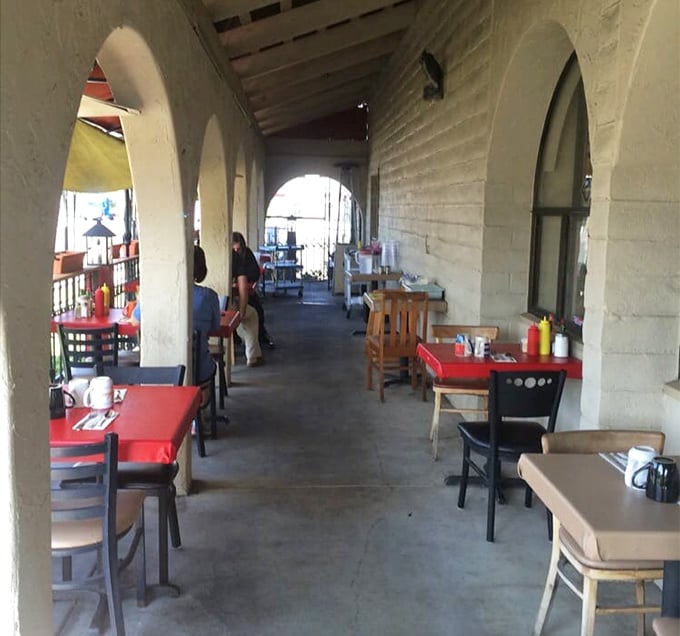 Outdoor seating under the arches offers California sunshine with your eggs—nature's perfect garnish.