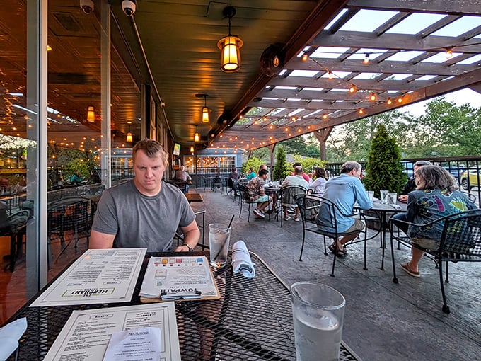 The patio: where summer evenings were meant to be spent. Dappled sunlight filters through the pergola as diners linger over meals and conversations.