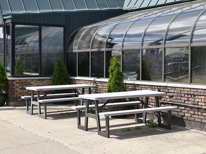 The outdoor picnic tables provide a perfect summer option – because sometimes pizza tastes even better with a side of sunshine and fresh air.