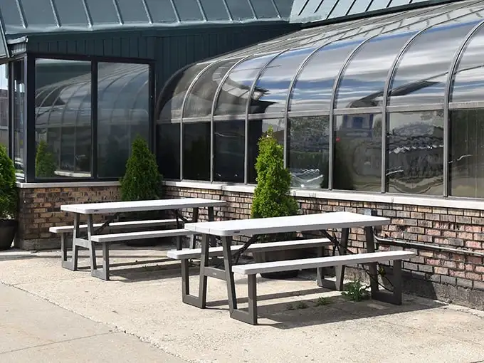 The outdoor picnic tables provide a perfect summer option – because sometimes pizza tastes even better with a side of sunshine and fresh air.