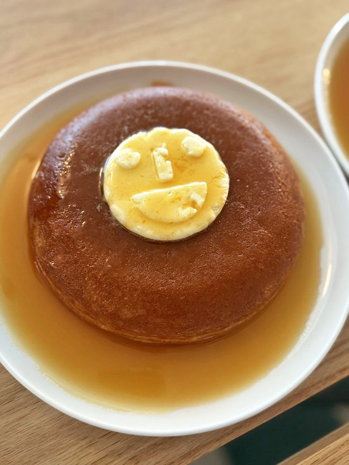 Pancake perfection topped with a butter smiley face—because Middle Child understands that breakfast should make you happy from the inside out.