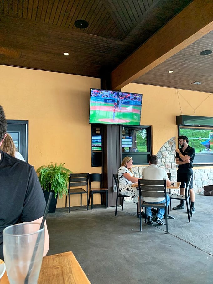 The patio seating offers fresh air with your fresh food – casual outdoor dining where baseball on TV meets conversations worth having.