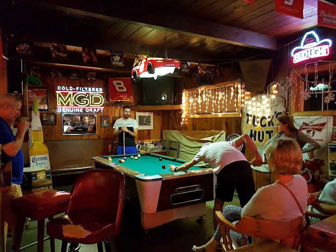 The pool table area isn't just a game space—it's where strangers become friends over missed shots and shared stories.