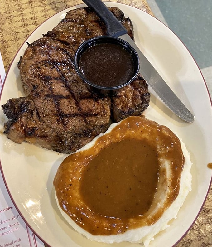 Prime rib that doesn't need fancy presentation to impress. That pool of au jus isn't just sauce—it's liquid gold for your taste buds.