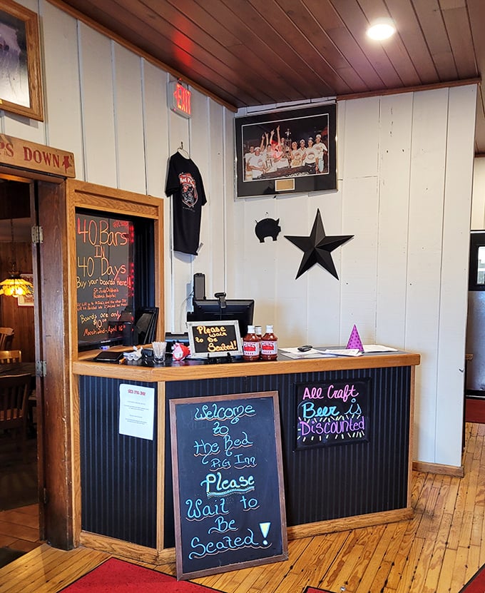 The host stand's chalkboard welcome feels like a friend's invitation to dinner. That "Please Wait to Be Seated" isn't just policy—it's a promise of good things to come.