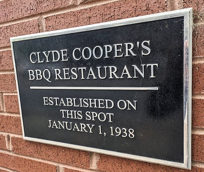 A plaque marking hallowed barbecue ground. Some people visit historical monuments; barbecue pilgrims come here instead. 