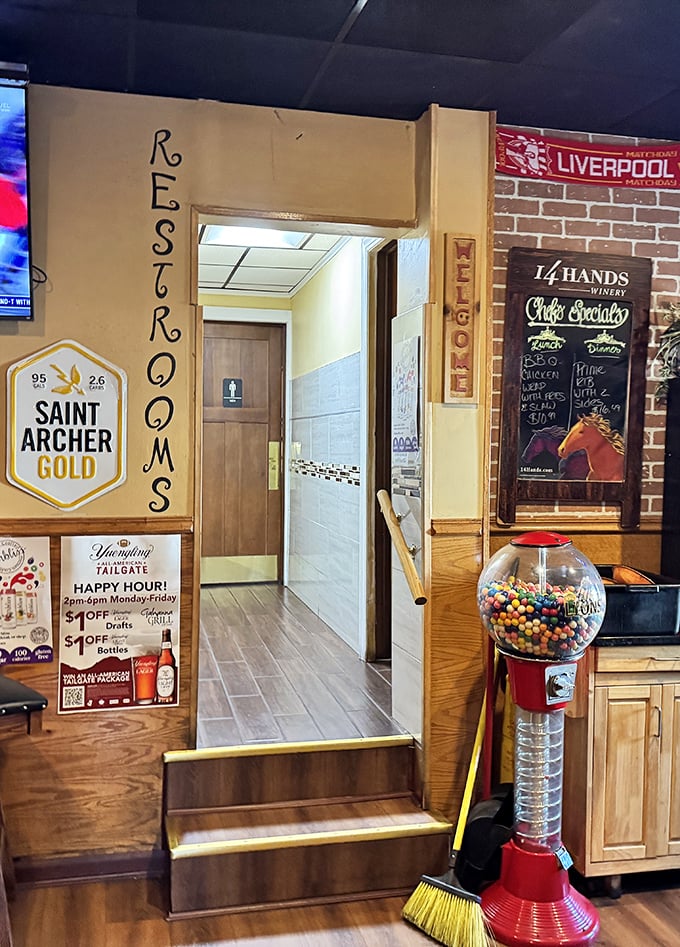 The path to the restrooms—a journey every burger enthusiast eventually makes. That Liverpool sign suggests even the Beatles would approve.