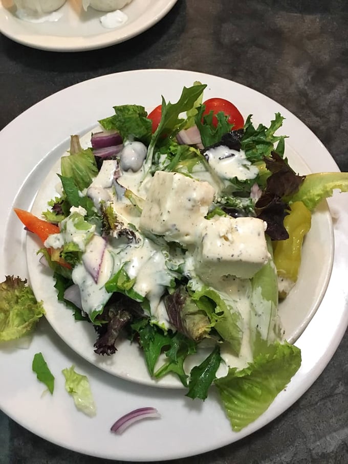 A Greek salad that somehow makes vegetables exciting – crisp, fresh, and adorned with enough feta to make any Mediterranean grandmother proud.