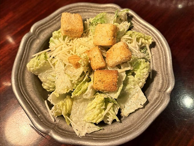 A Caesar salad that remembers its purpose: to refresh and prepare, not to apologize for the main event.