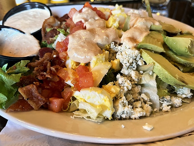 A salad that's actually exciting to eat! Crisp greens topped with avocado, bacon, egg, and blue cheese—proof that healthy can be indulgent.