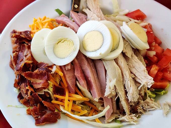 This chef's salad isn't just a meal – it's a colorful celebration of protein and vegetables that somehow makes healthy eating feel indulgent.