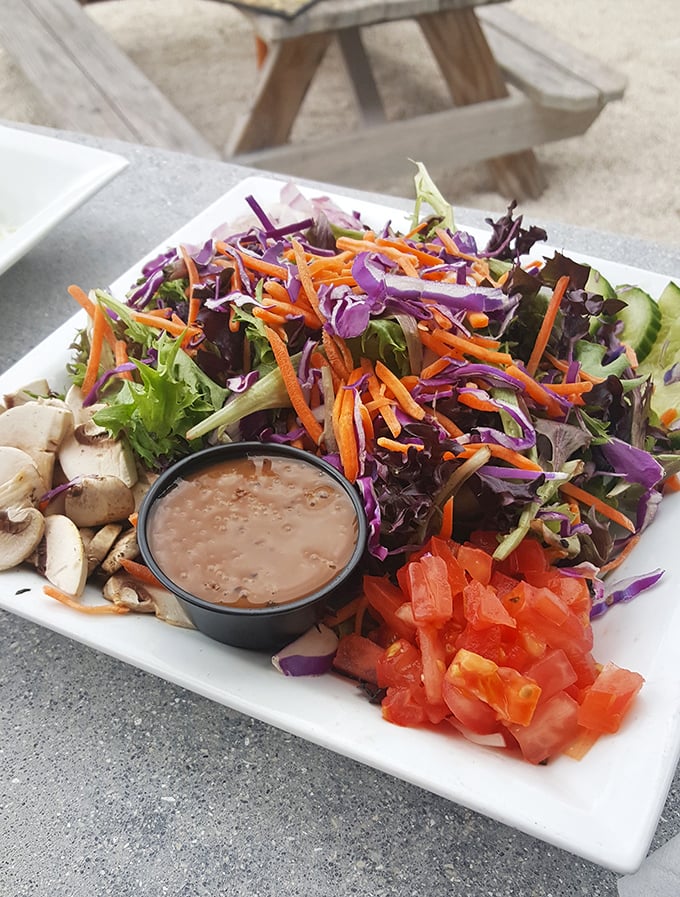 A salad that doesn't apologize for being healthy—vibrant, crisp, and colorful enough to make you temporarily forget about the fried options you almost ordered.