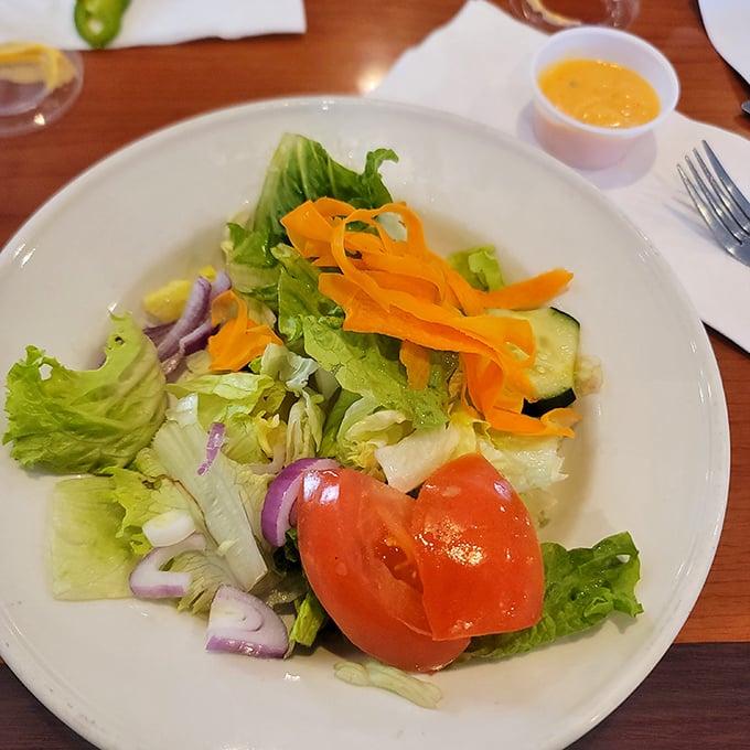 A garden on a plate—this salad brings together crisp lettuce, vibrant vegetables, and that special something that makes you feel virtuous while actually enjoying it.