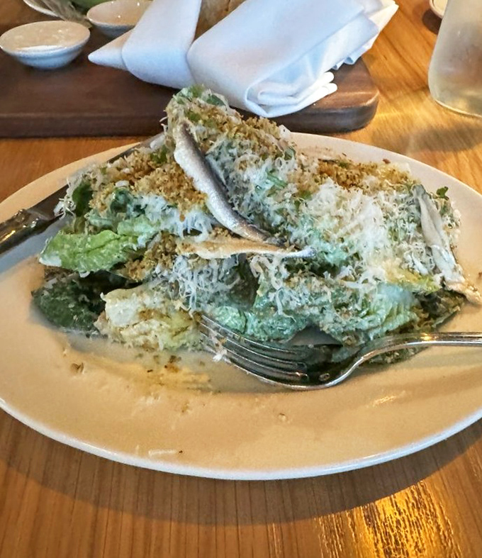 This Caesar salad doesn't just pay homage to tradition – it celebrates it with crisp romaine, perfect dressing, and a shower of Parmesan.